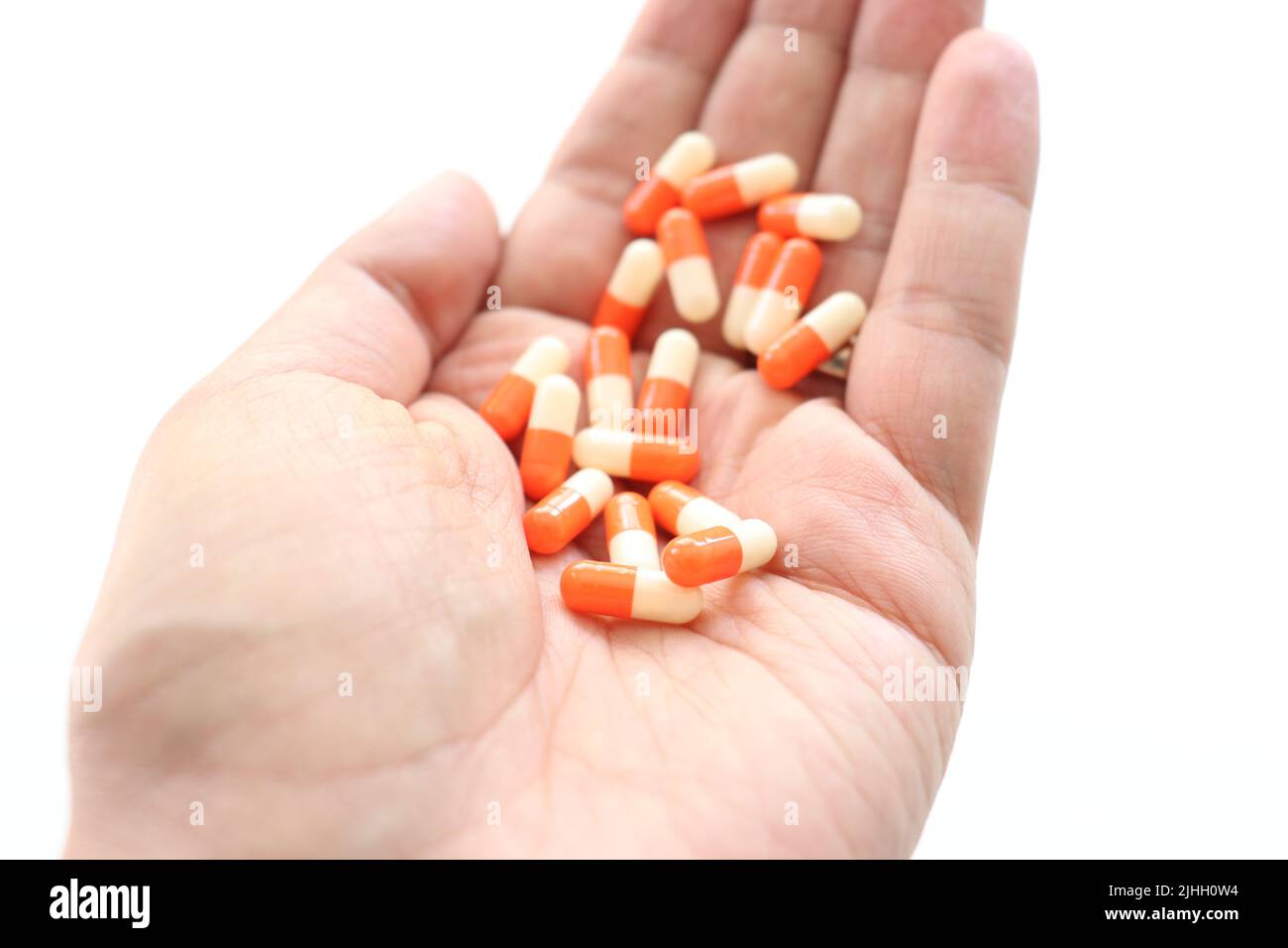 Closeup hand takes white tablets hi-res stock photography and images ...