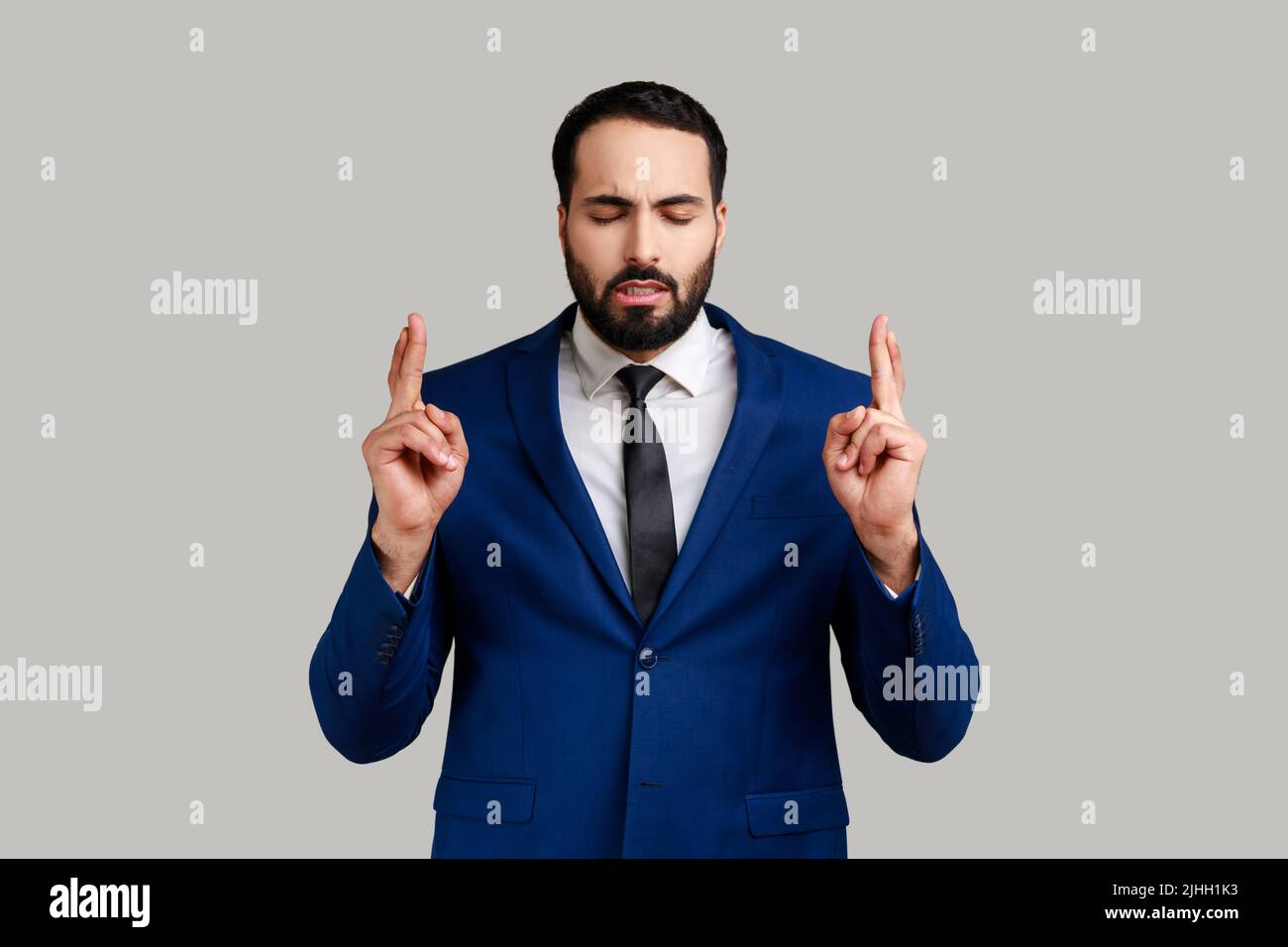 Praying man suit hi-res stock photography and images - Alamy