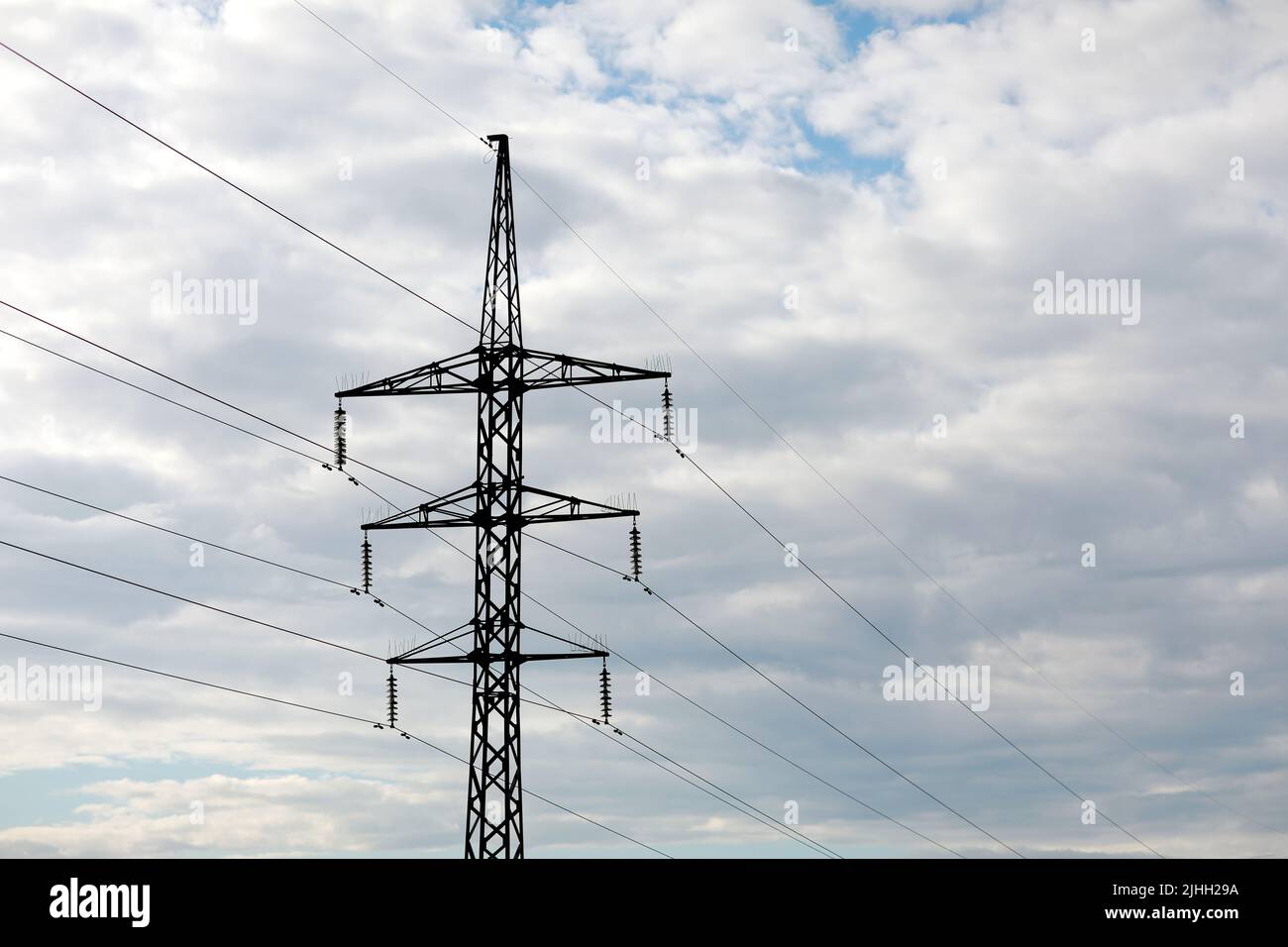 high-voltage power lines on blue sky background. electricity ...