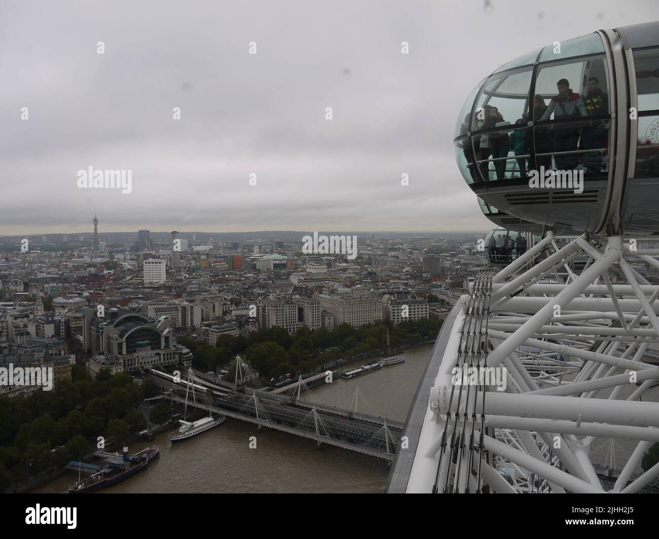 Passengers on the London Eye overlook Charing Cross Station, Hungerford ...