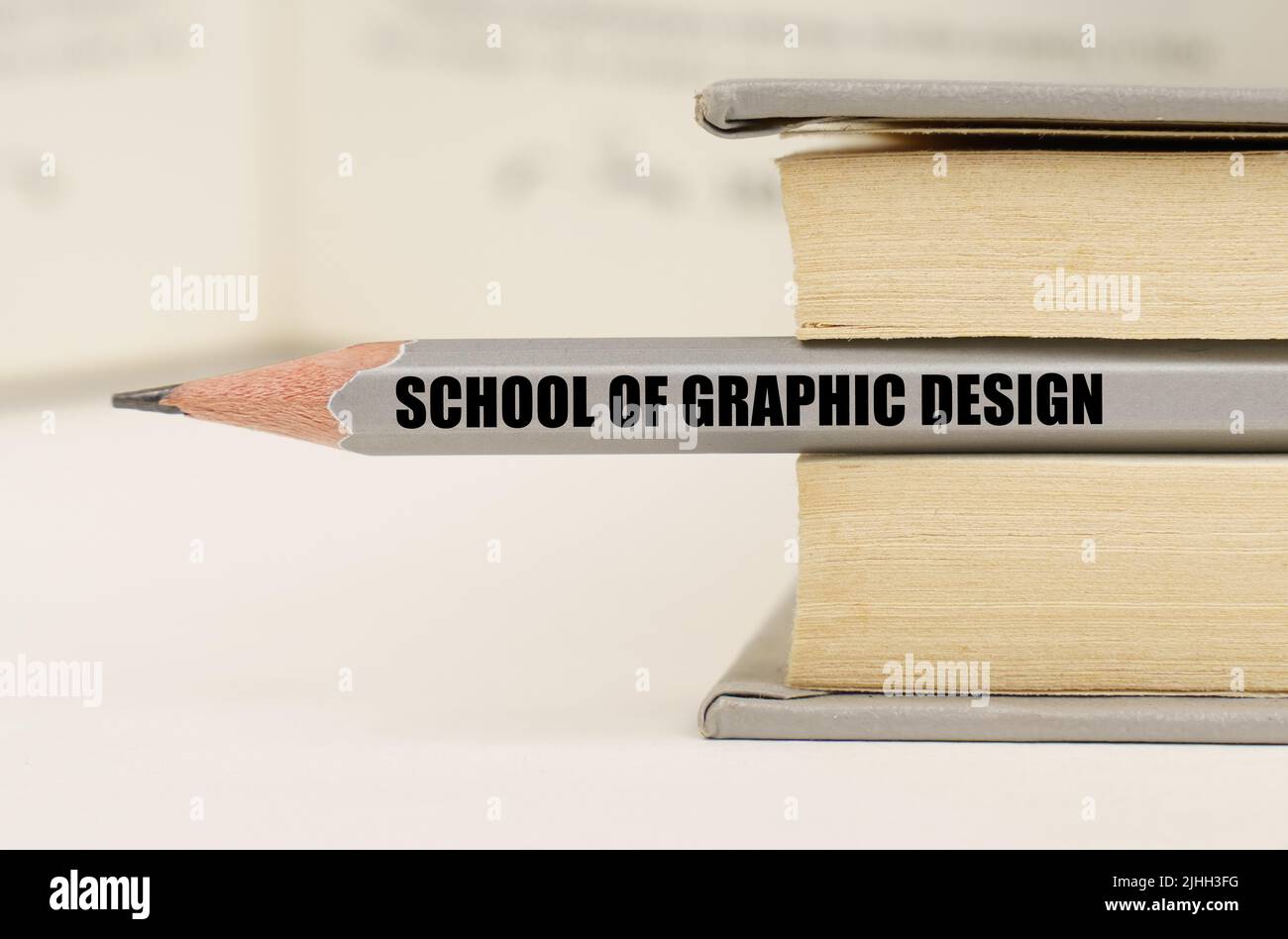 Education concept. In the book between the pages lies a pencil with the ...