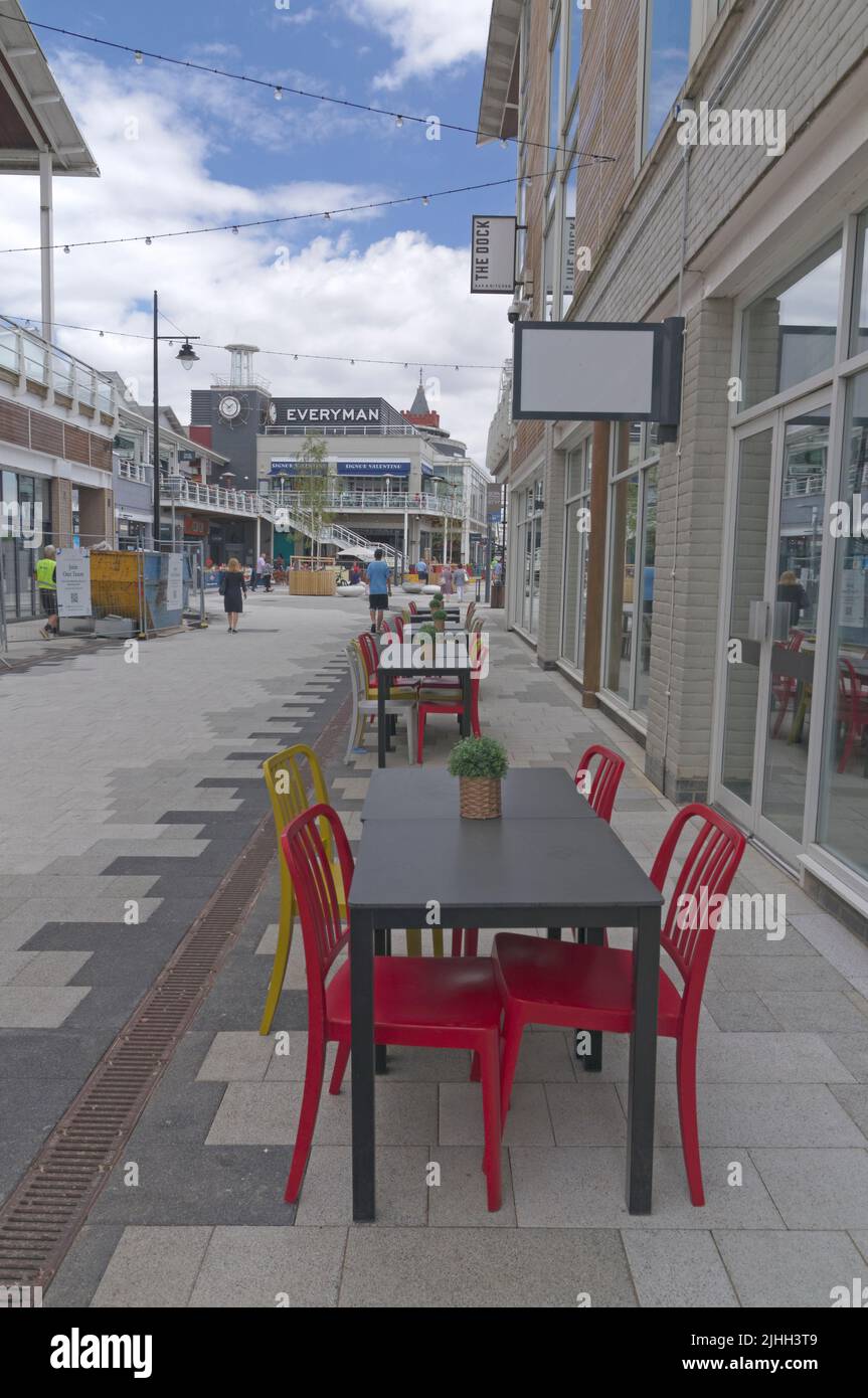 Attractive tables and chairs outside a restaurant at Cardiff Bay ...