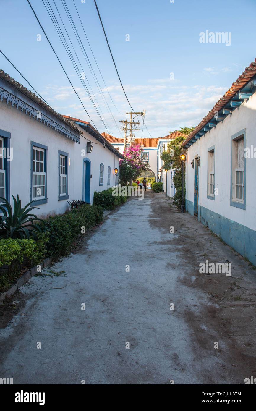 Street with typical blue and white colonial houses, in the neighborhood ...