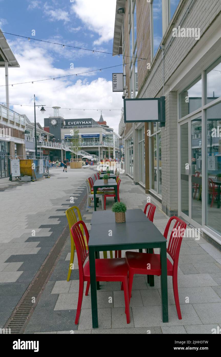 Attractive tables and chairs outside a restaurant at Cardiff Bay ...