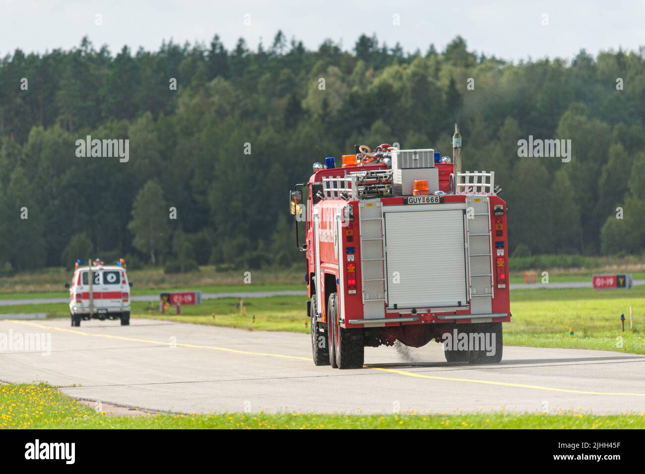 Firetruck driving to an emergency call hi-res stock photography and ...