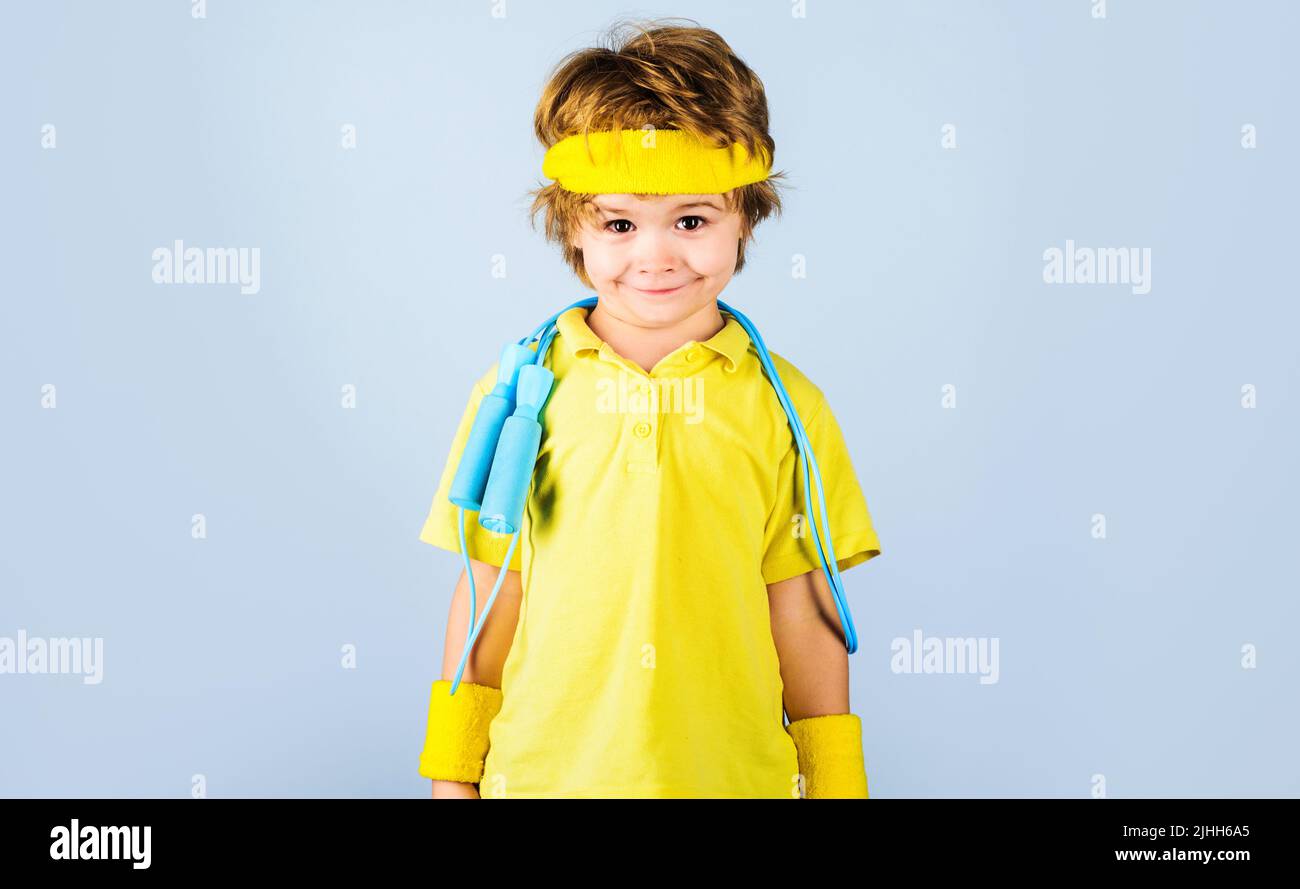 Sporty boy with skipping rope. Little kid doing sports. Fitness ...