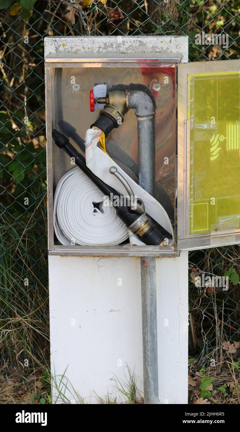 Fire column with hose and lance to put out fires Stock Photo - Alamy