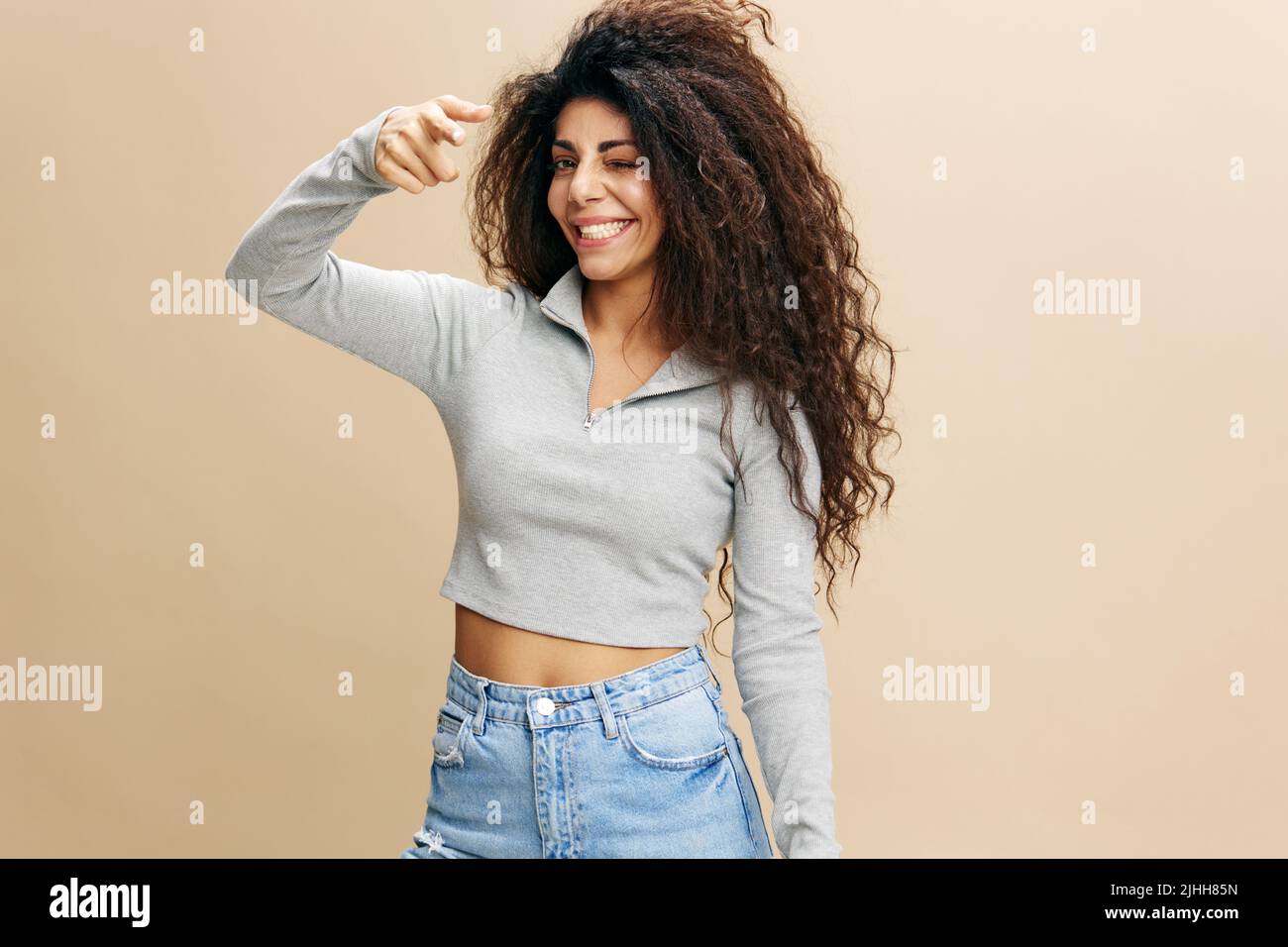You Are Next. Cheerful Young Latin Woman Pointing Finger At Camera ...