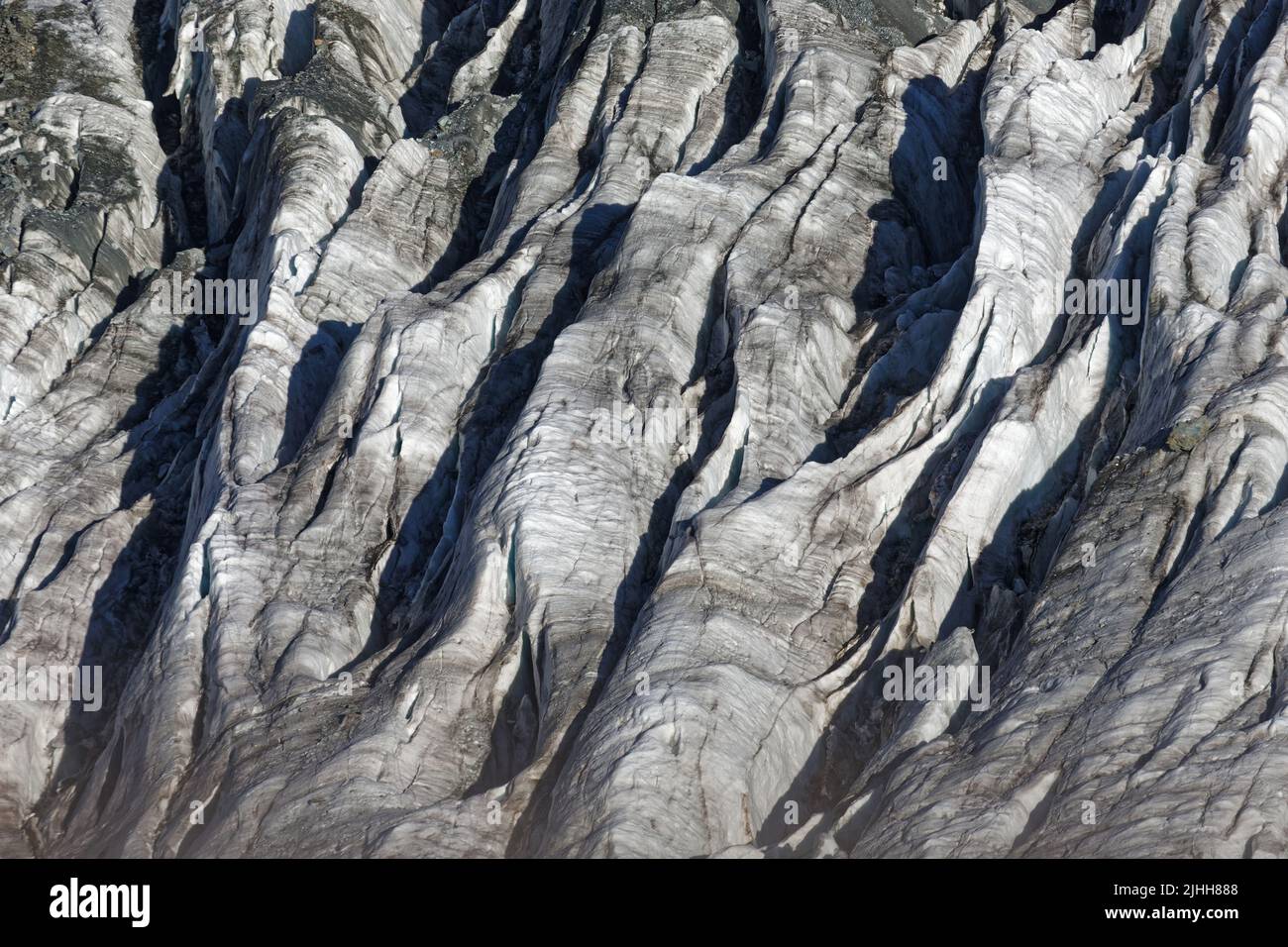 Patterns design of ice on a mountain glacier Stock Photo - Alamy