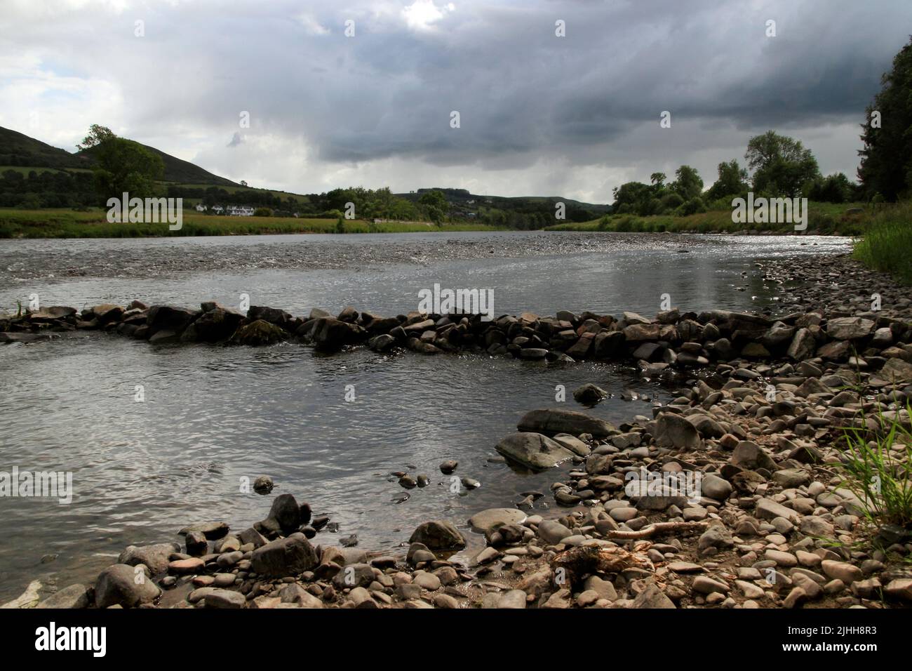 Scottish river, River Tweed with the Eildon Hills in the background ...