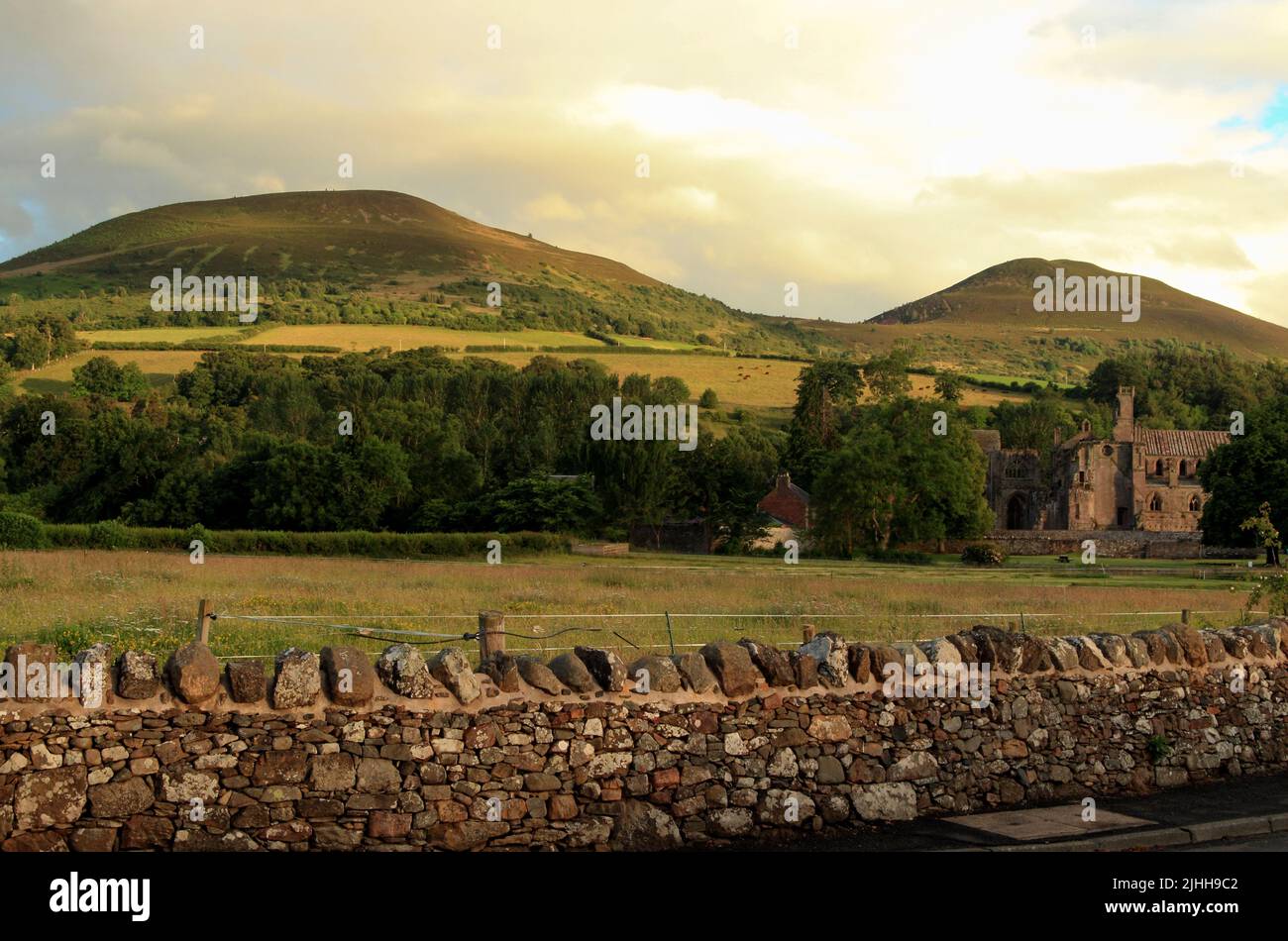 Ruins of Melrose Abbey, a Cistercian monastery in the Scottish Borders ...