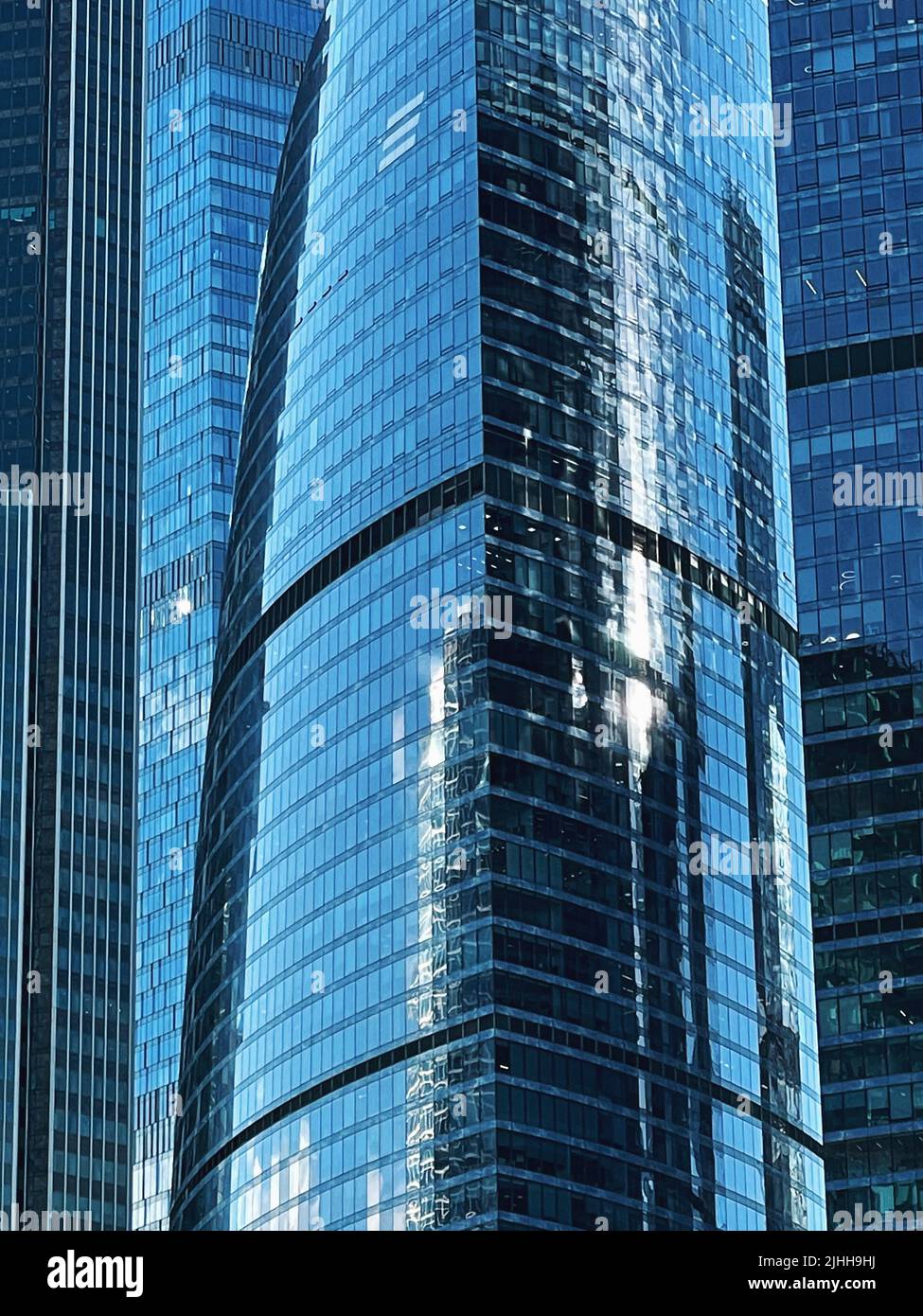Three glass skyscrapers in downtown Stock Photo - Alamy