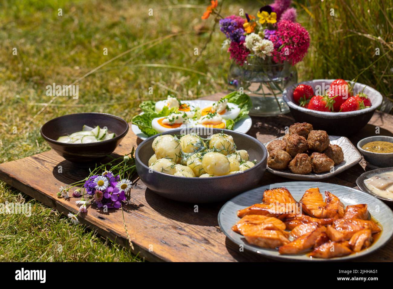 Scandinavian midsummer meal with potato salad, salmon and eggs Stock ...