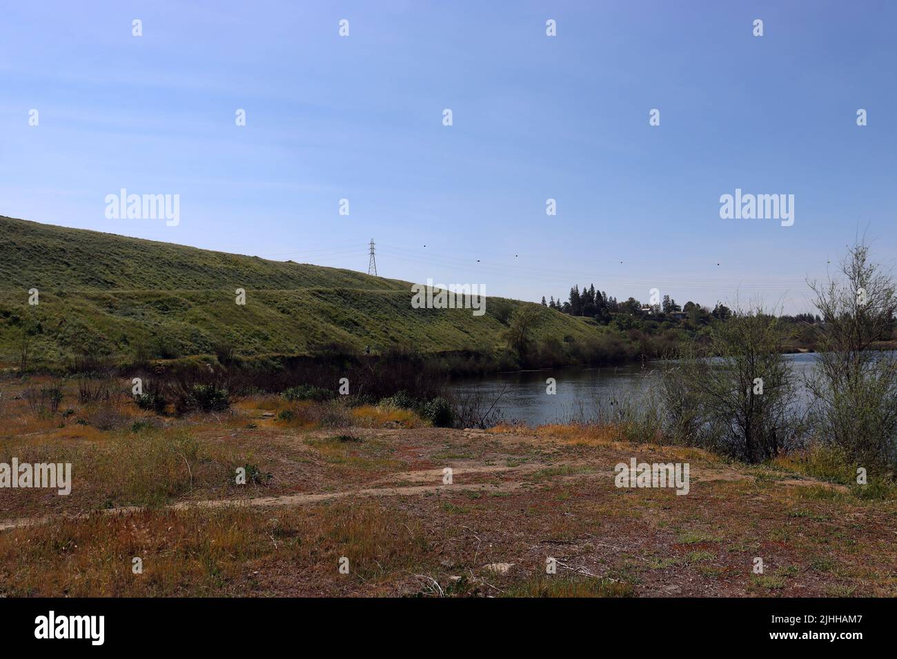 What can one see when walking along the San Joaquin River where it runs ...
