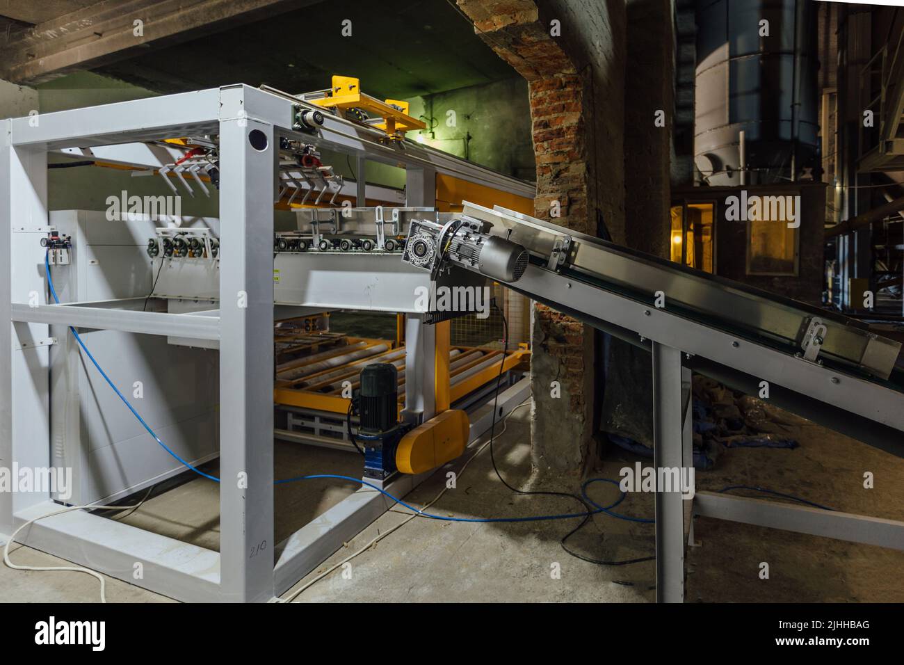 Cement packaging, bagging and stacking machine Stock Photo - Alamy