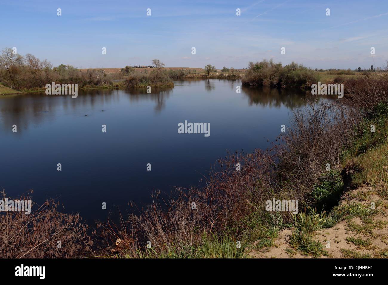 What can one see when walking along the San Joaquin River where it runs ...