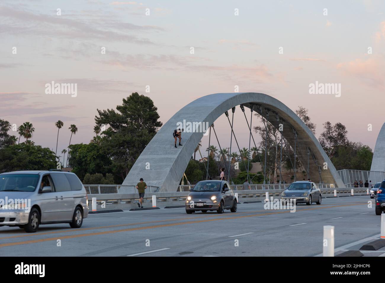 Daredevil climbs one of the arches of the 6th street bridge in Los ...