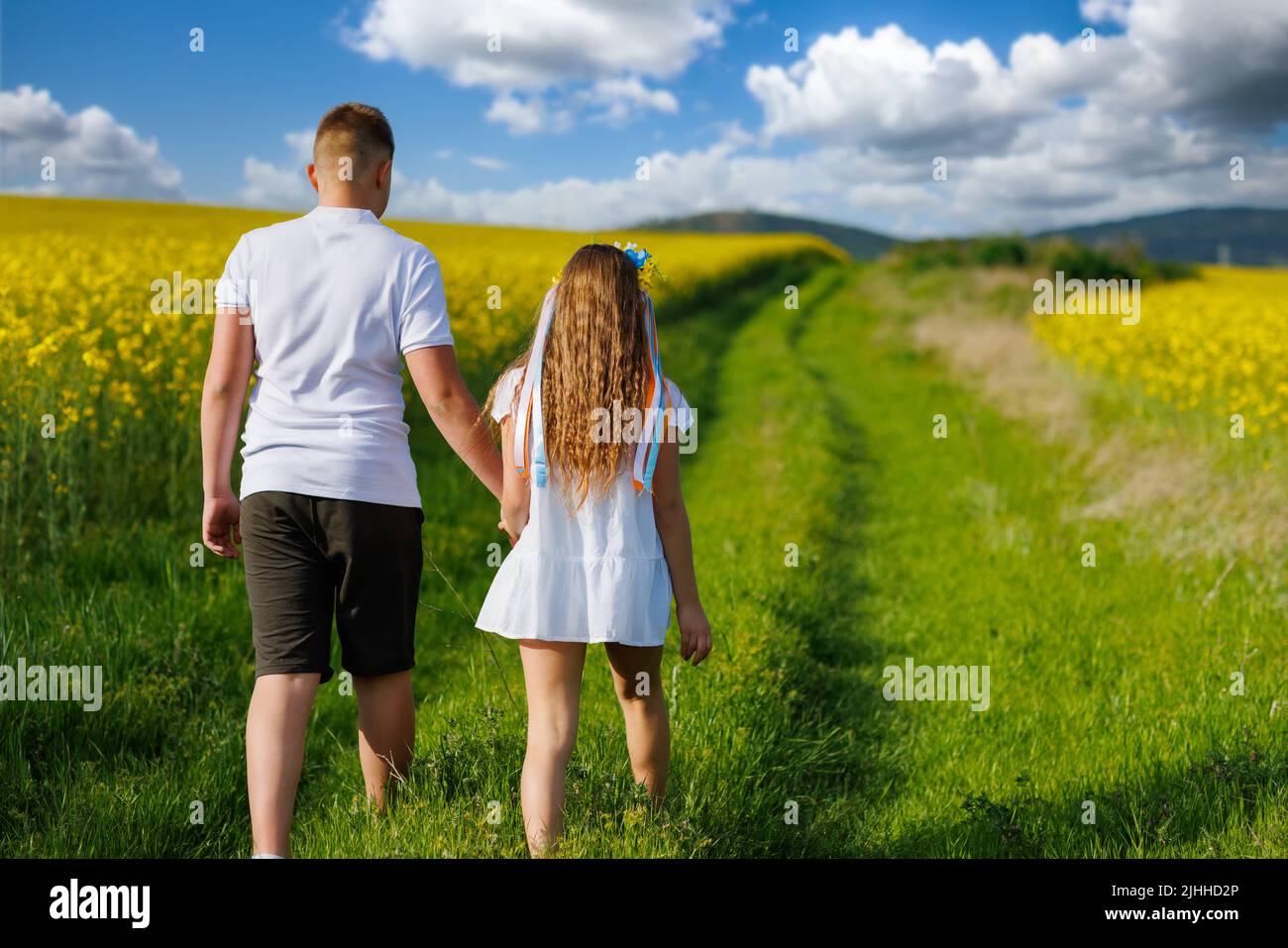 Brother and older sister rear view hi-res stock photography and images ...