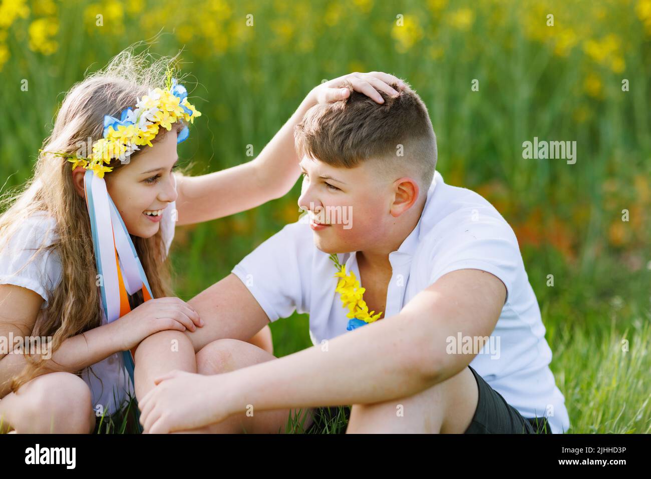 Native joyful teenage children enjoying warm weather: big strong kind ...