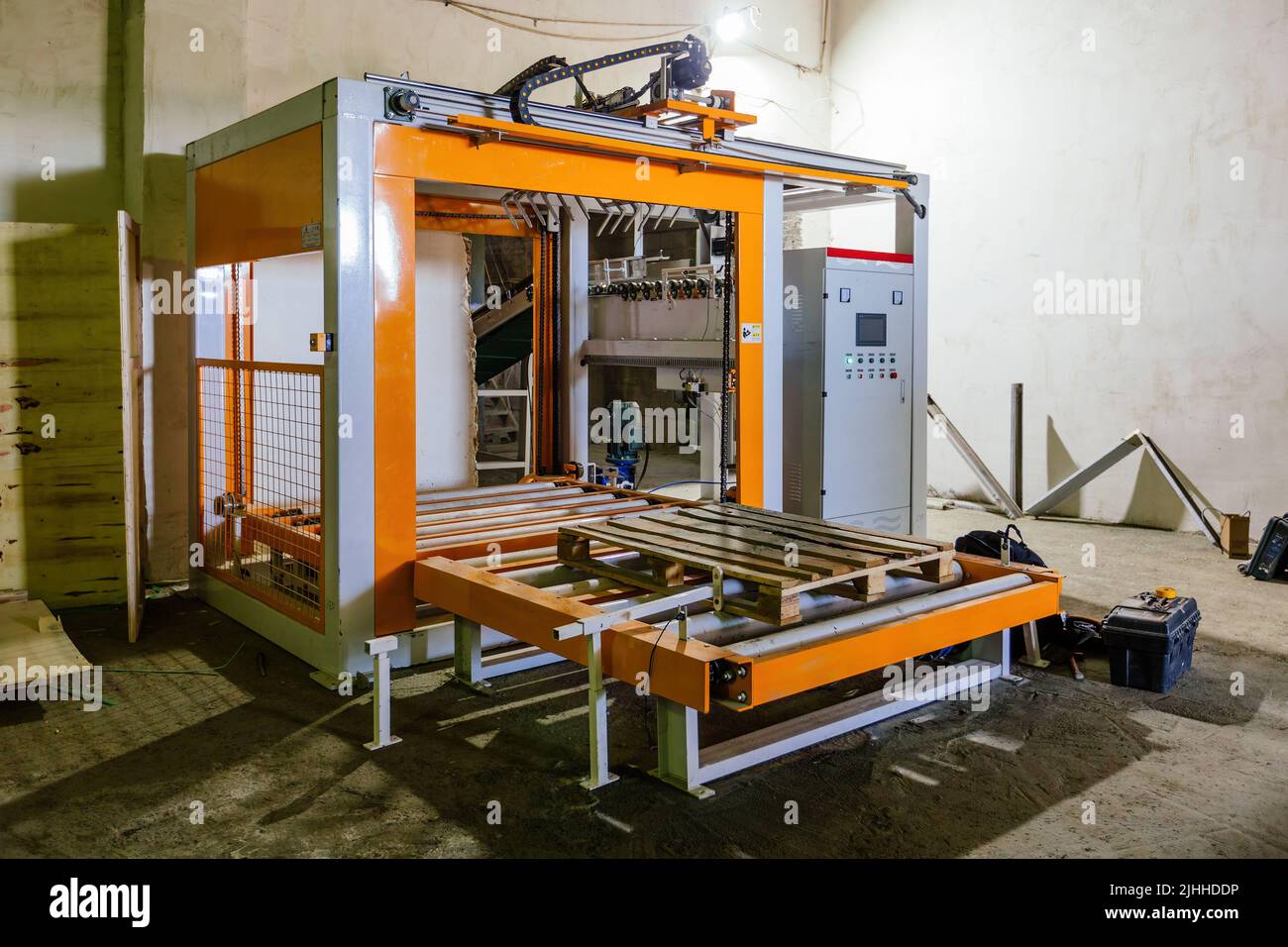 Cement packaging, bagging and stacking machine Stock Photo - Alamy