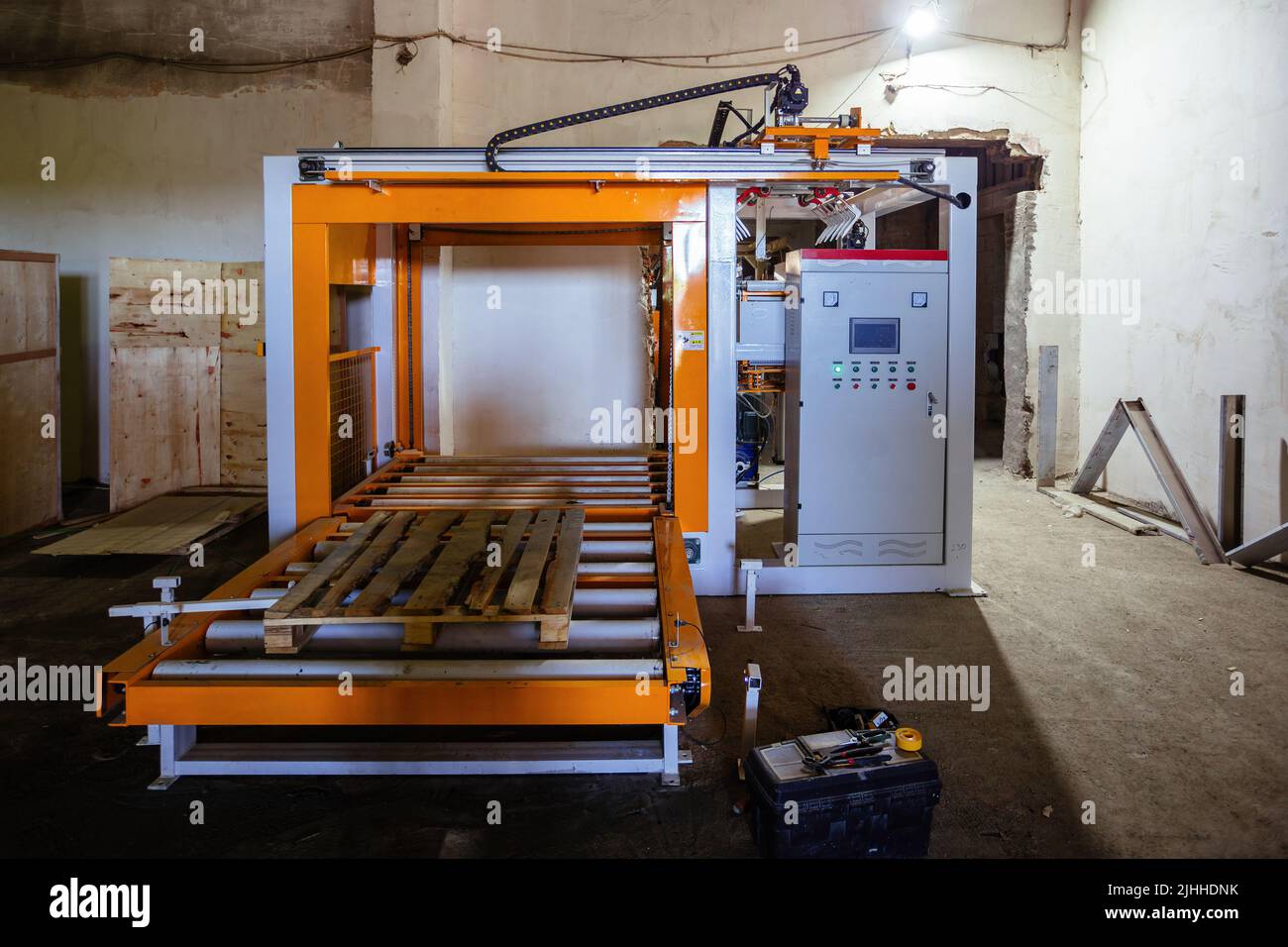 Cement packaging, bagging and stacking machine Stock Photo - Alamy
