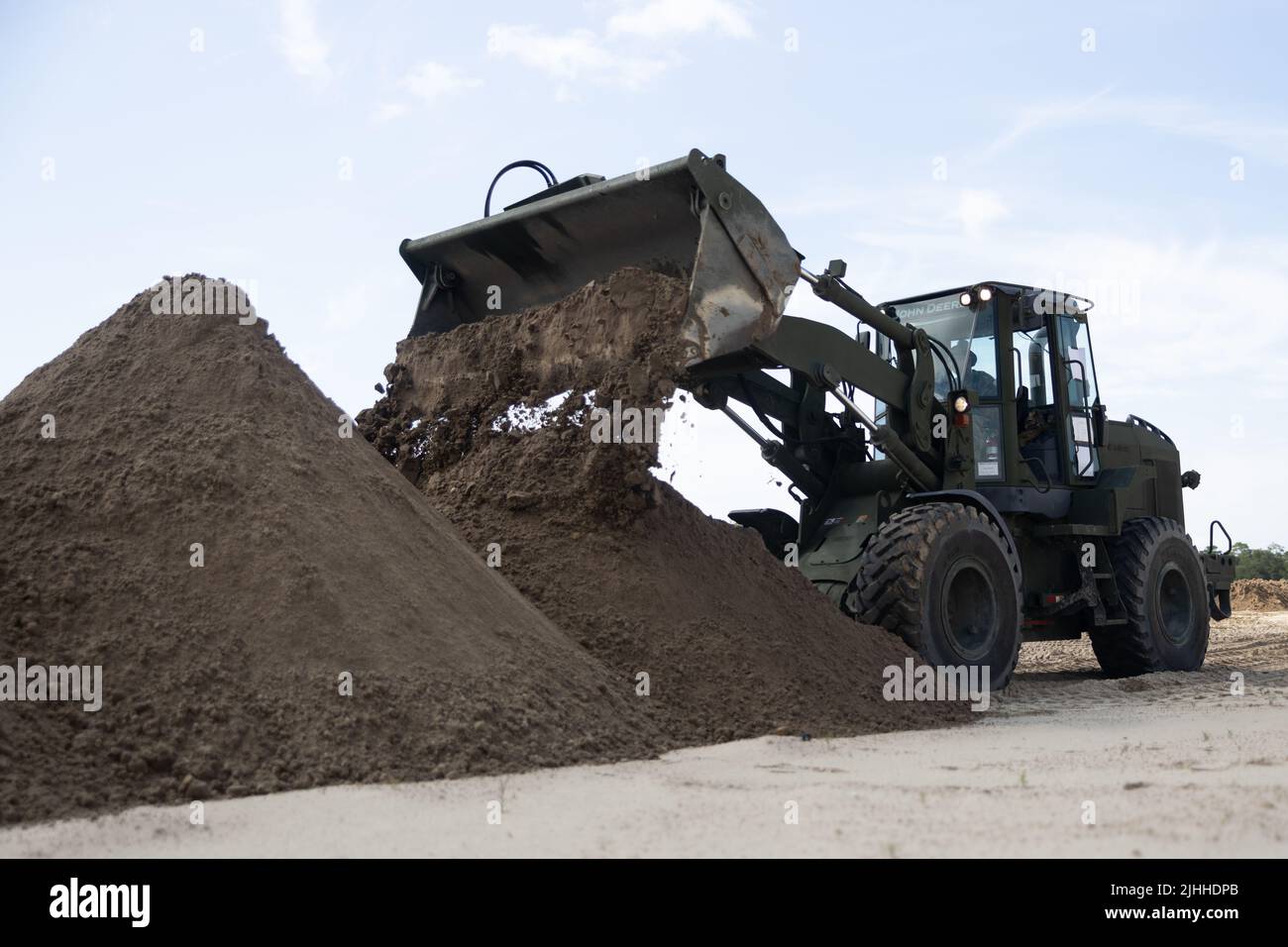 U.S. Marine Corps Lance Cpl. George Anzures, an engineer equipment ...