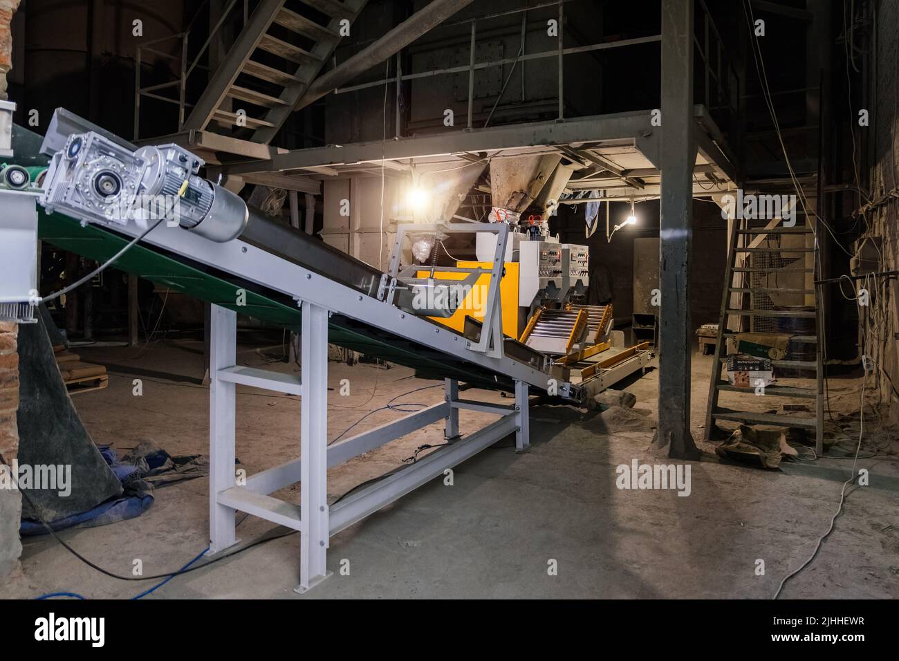 Cement packaging, bagging and stacking machine Stock Photo - Alamy