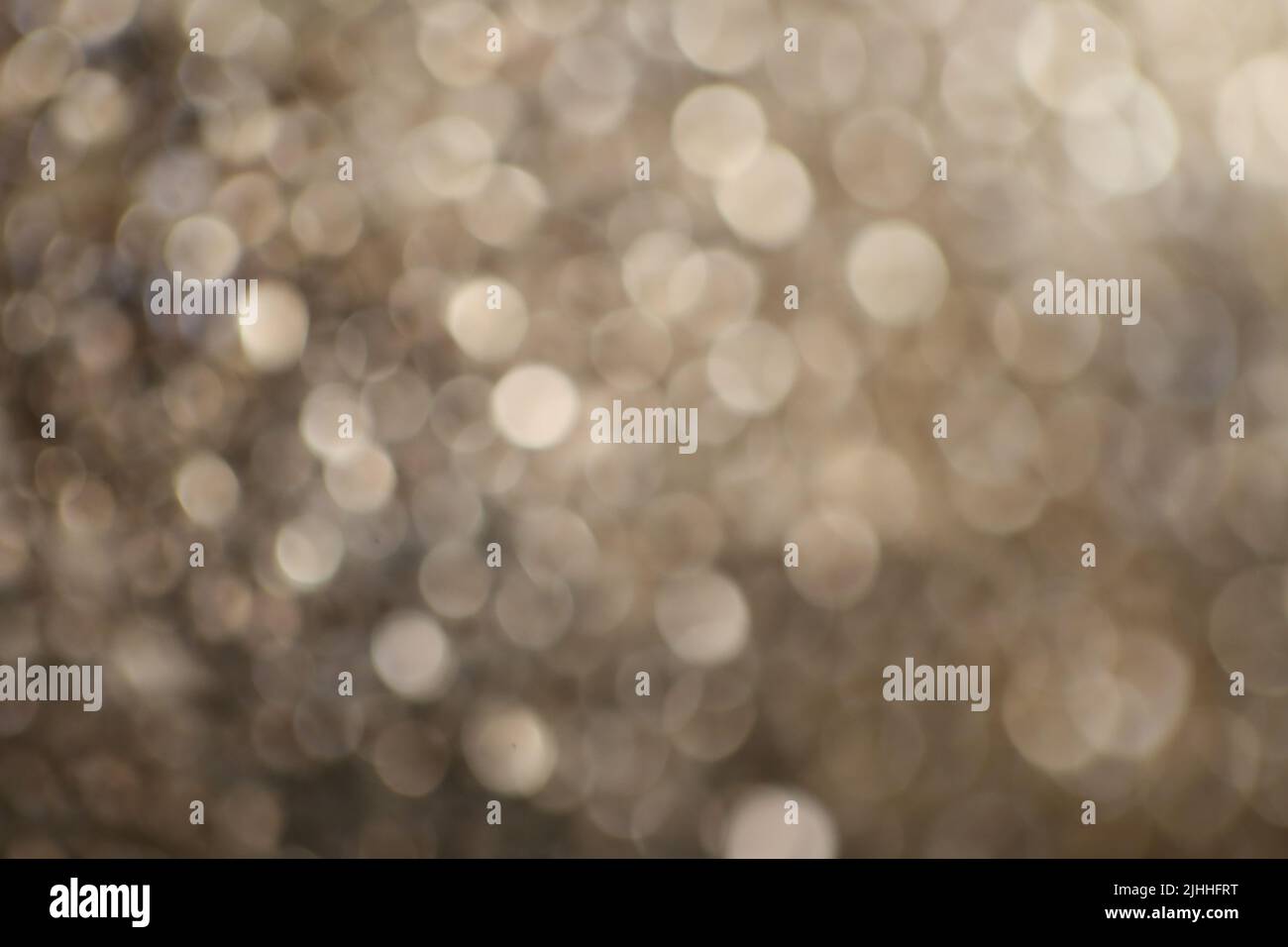 beige bokeh on a black background.Wallpaper phone.Festive Background ...