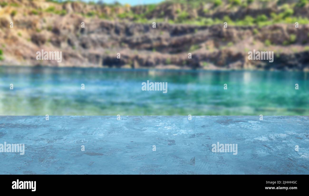 Empty table near mountain lake. Mockup for design Stock Photo - Alamy