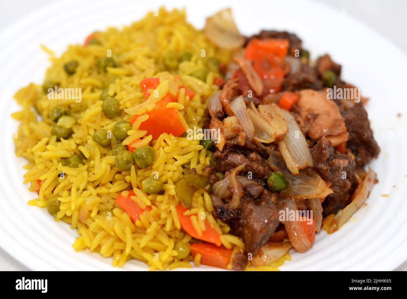 A Chinese food cuisine meal of spicy beef red meat with soy sauce and ...