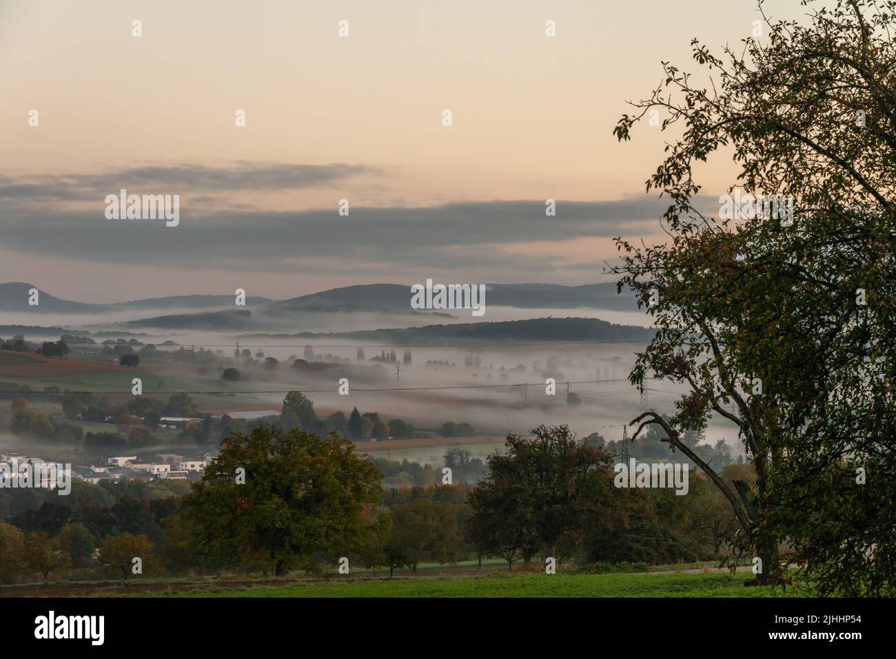Sunrise over rolling hills and pastures in Southern Germany Stock Photo ...