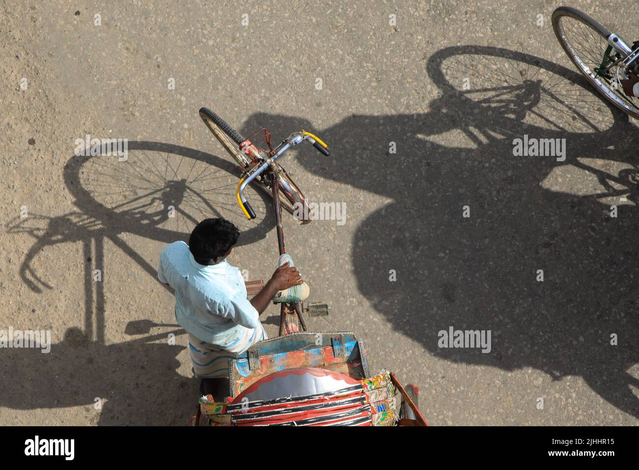 Dhaka, Bangladesh. 18th July, 2022. A rickshaw puller seen waiting for ...