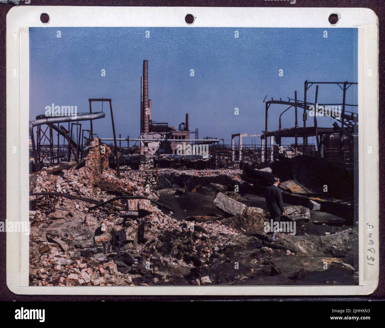 Dr. Albrecht Examining What Remains Of The Deurag-Neurag Oil Refinery ...
