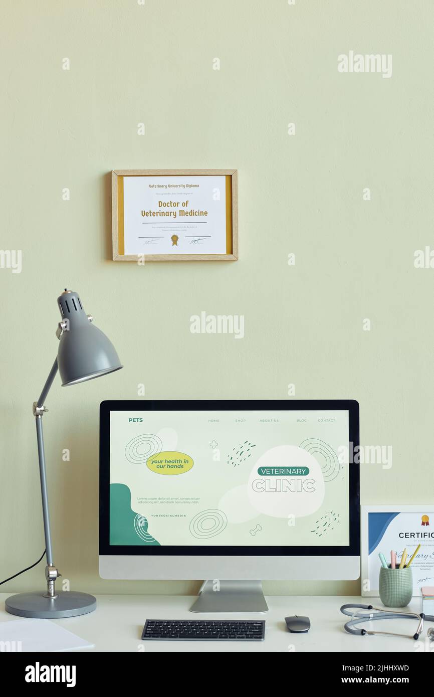 Vertical background image of workplace with computer and certificates ...