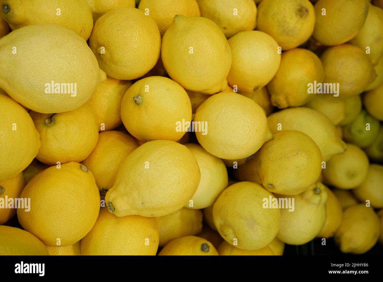 Yellow Lemon display for sale at local store top view Stock Photo - Alamy