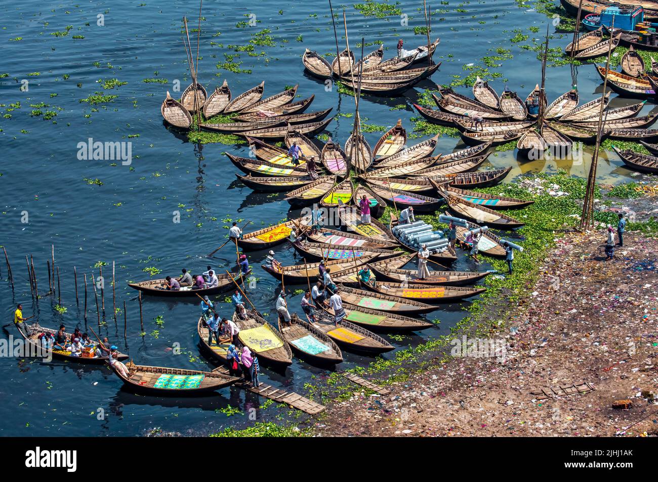 Wooden boats are lined up riverside which created various beautiful ...