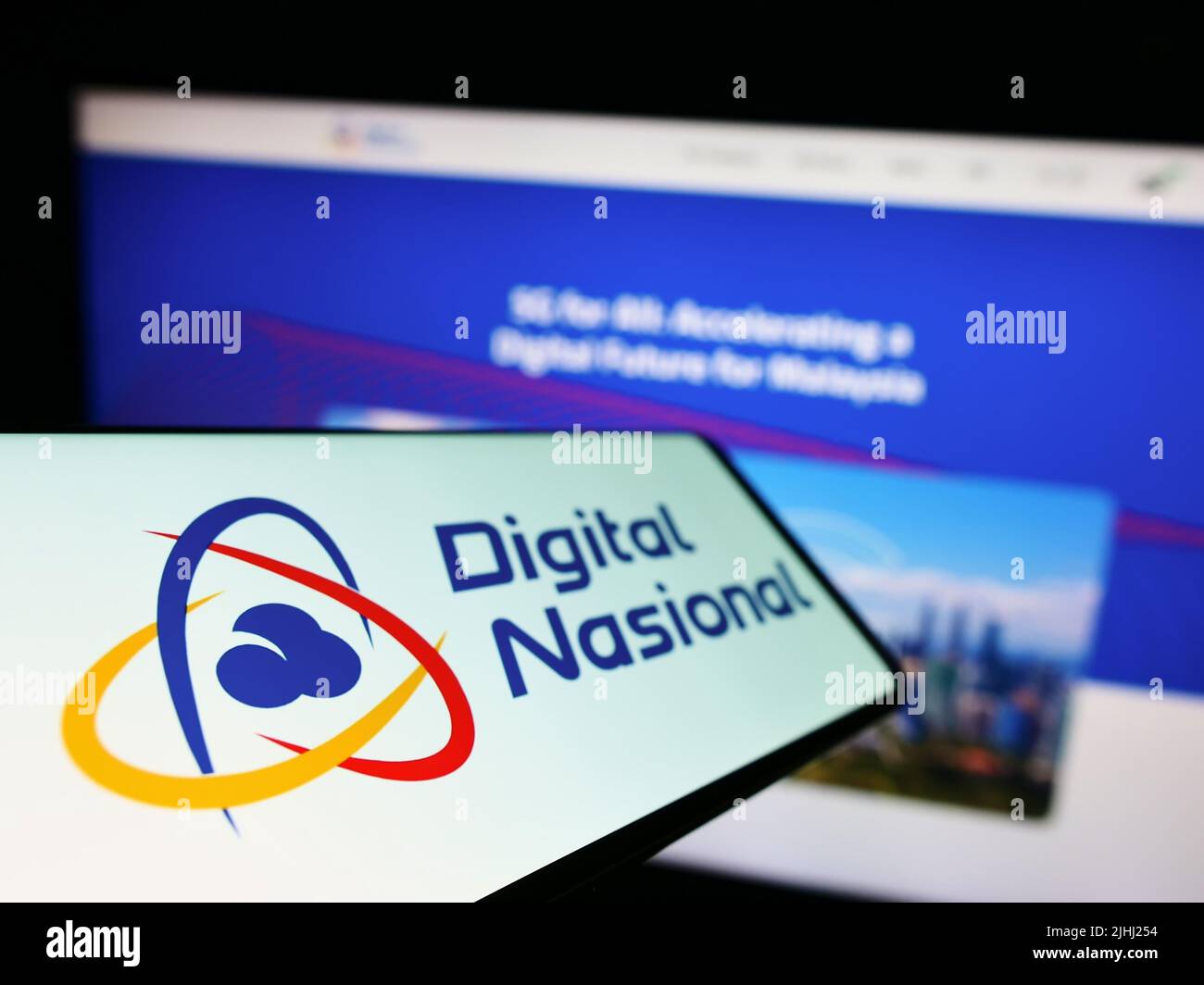 Mobile phone with logo of Malaysian company Digital Nasional Berhad ...