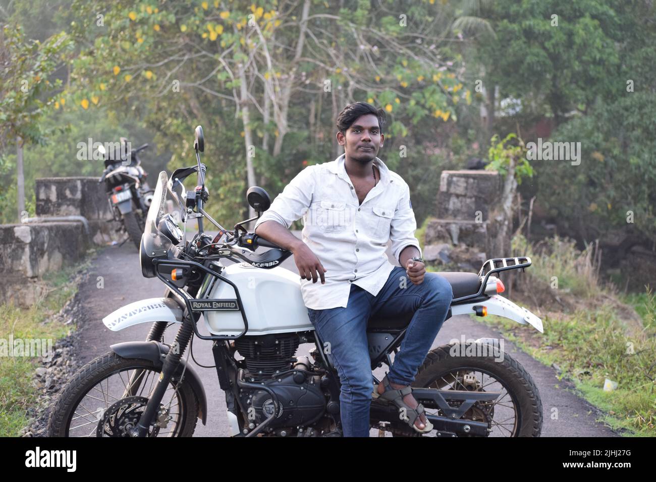 Indian man riding bike hi-res stock photography and images - Alamy