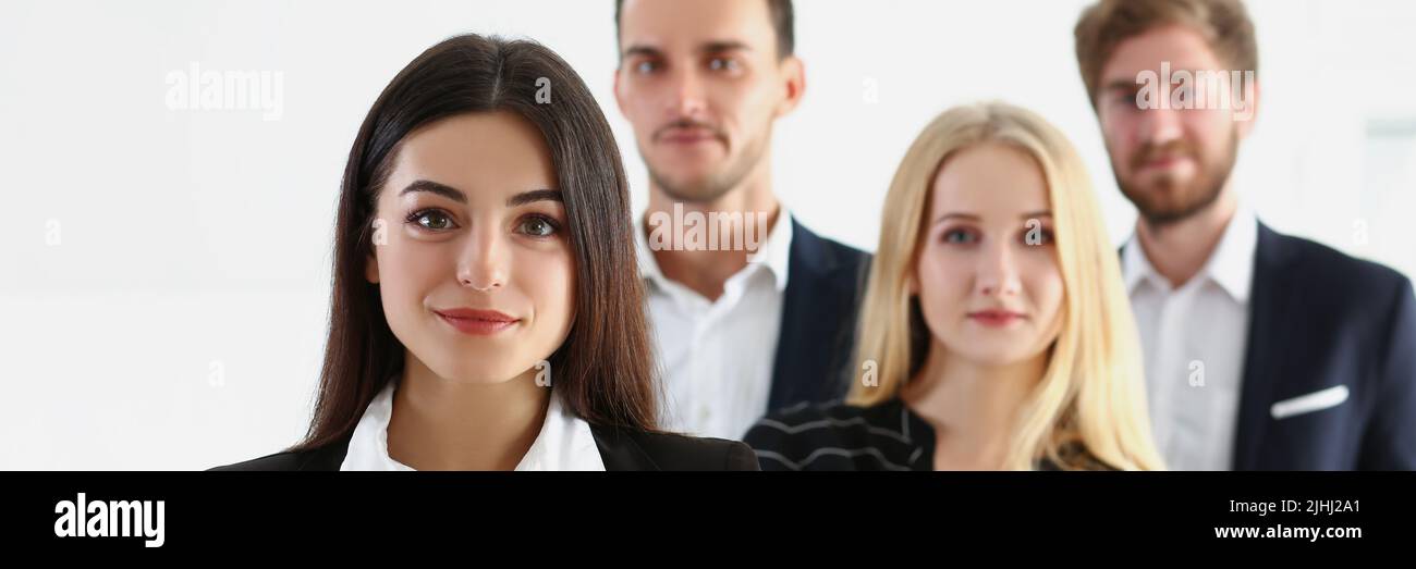 Confident team of successful people, men and women coworkers pose for ...