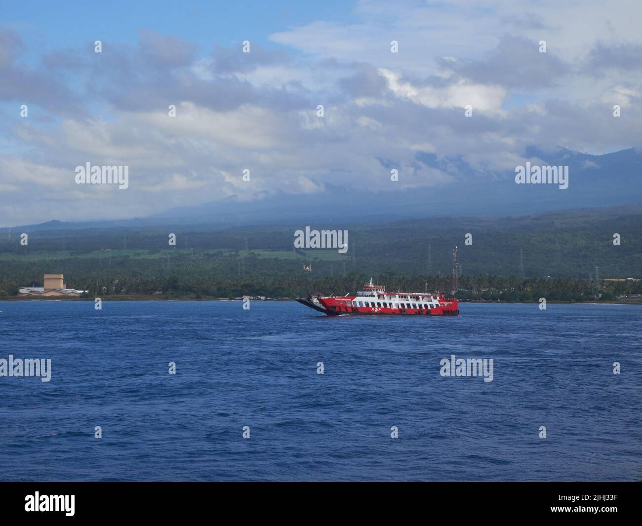 a passenger ferry that crosses the strait between the island of Java ...