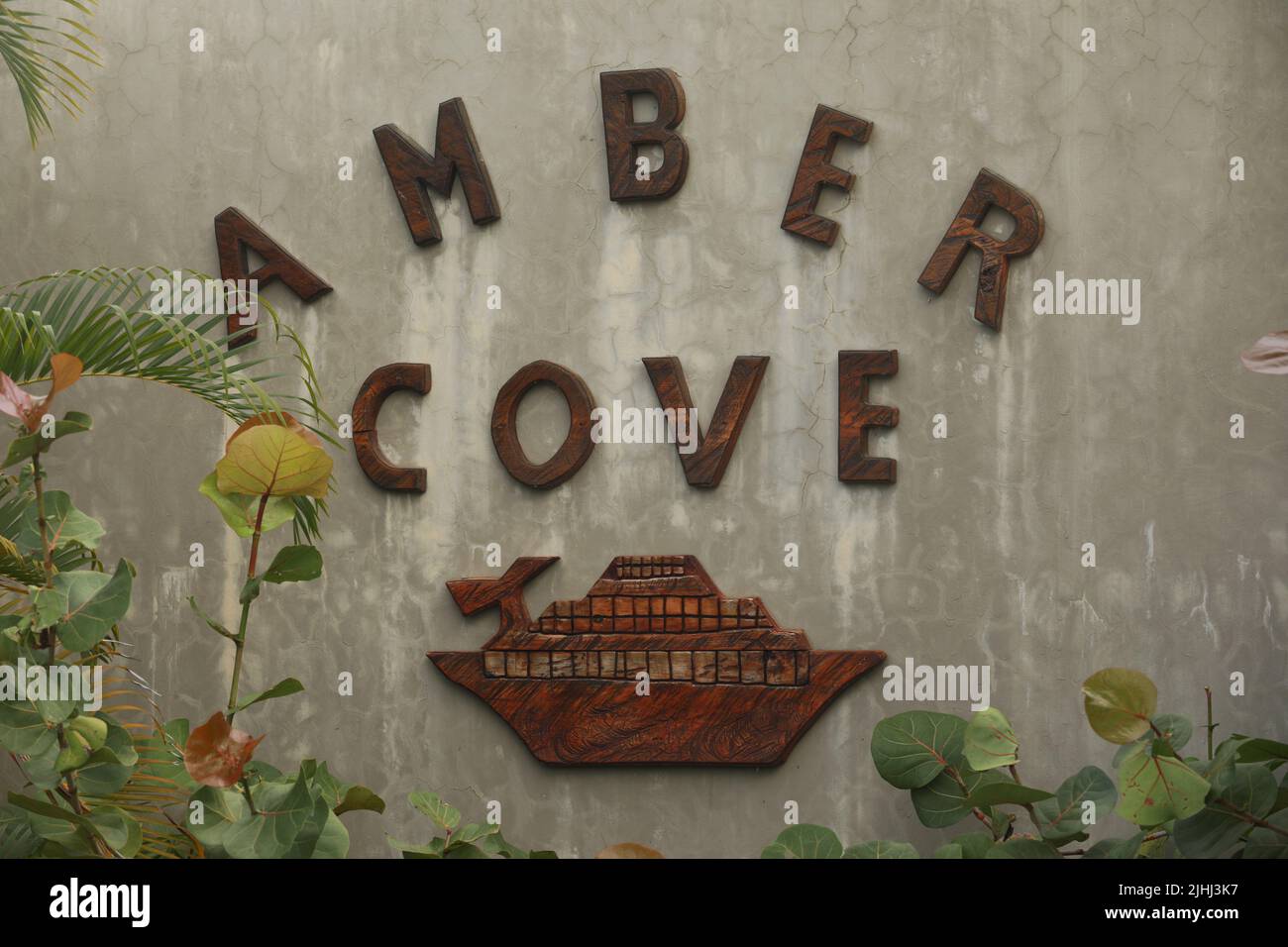 Amber Cove Cruise port sign on a brick wall.Dominican republick ...