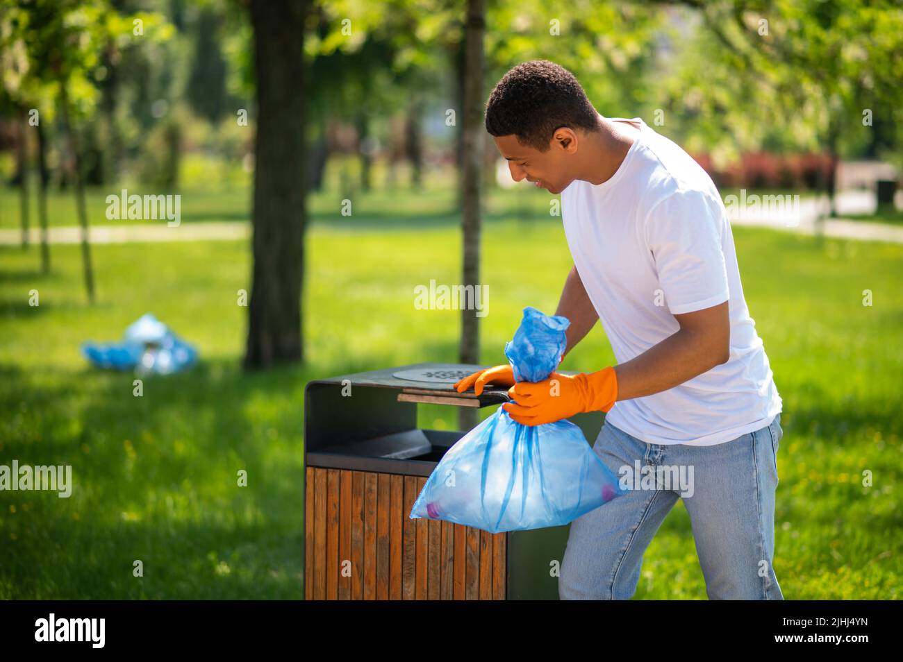Dumpster and man hi-res stock photography and images - Alamy