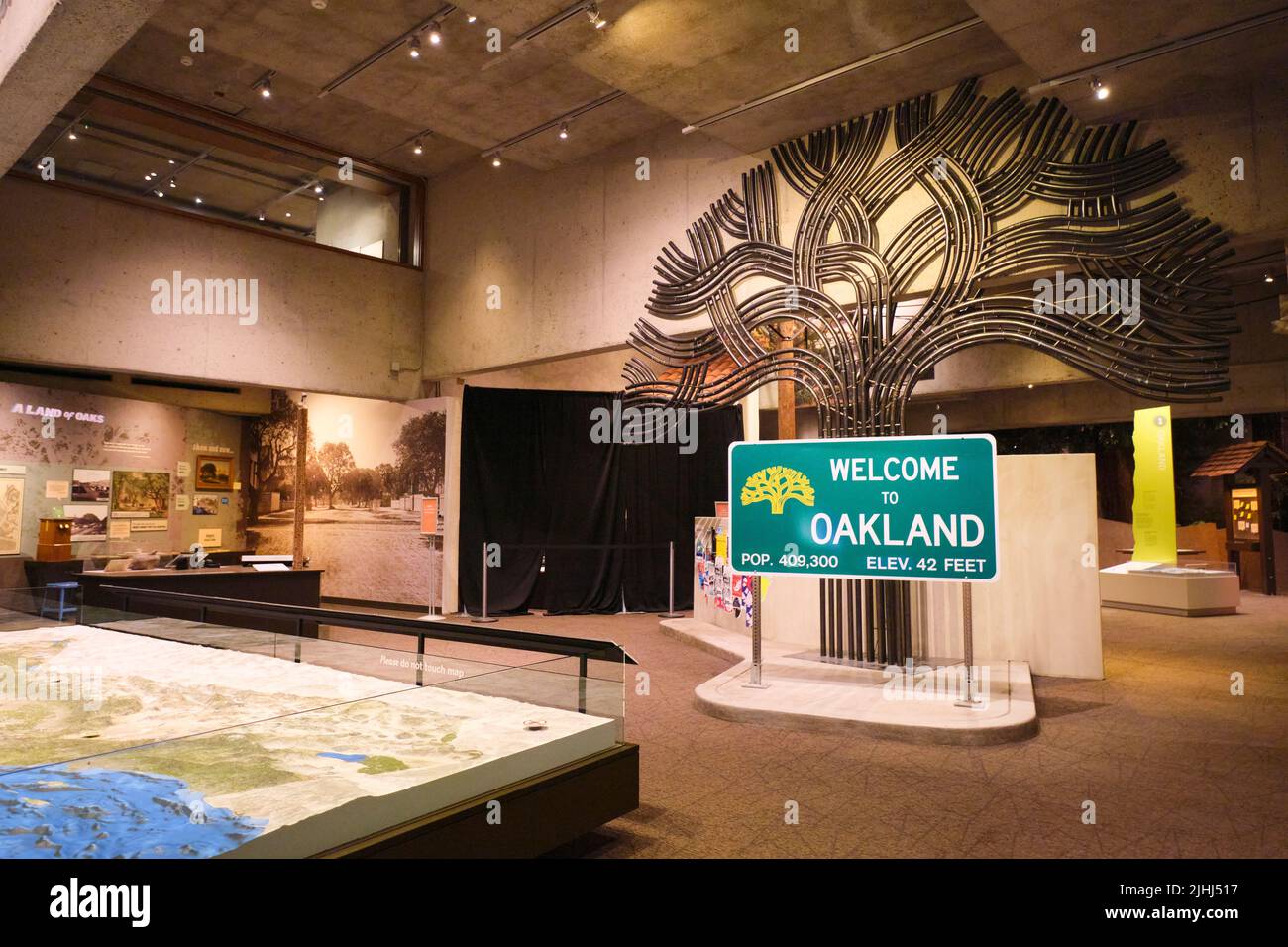 A green, metal, street, road, highway sign, Welcome to Oakland. At the ...