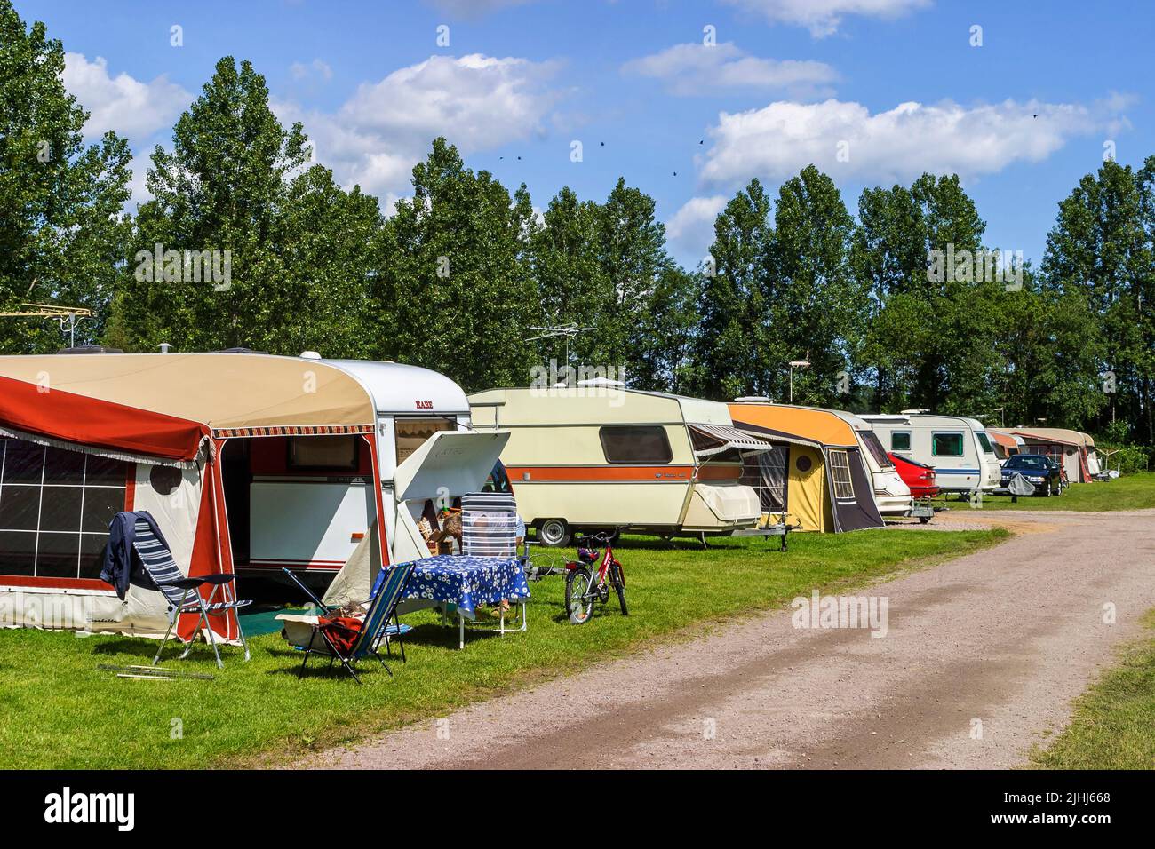 Campsite with caravans in summer Stock Photo - Alamy