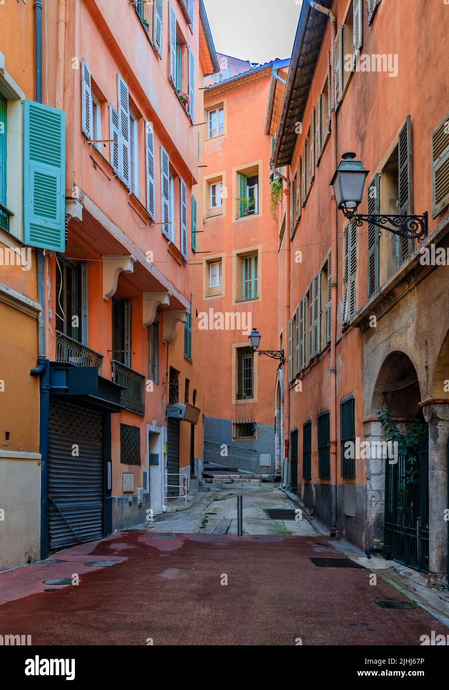 Narrow crooked street in the Old Town, Vieille Ville in Nice, French ...