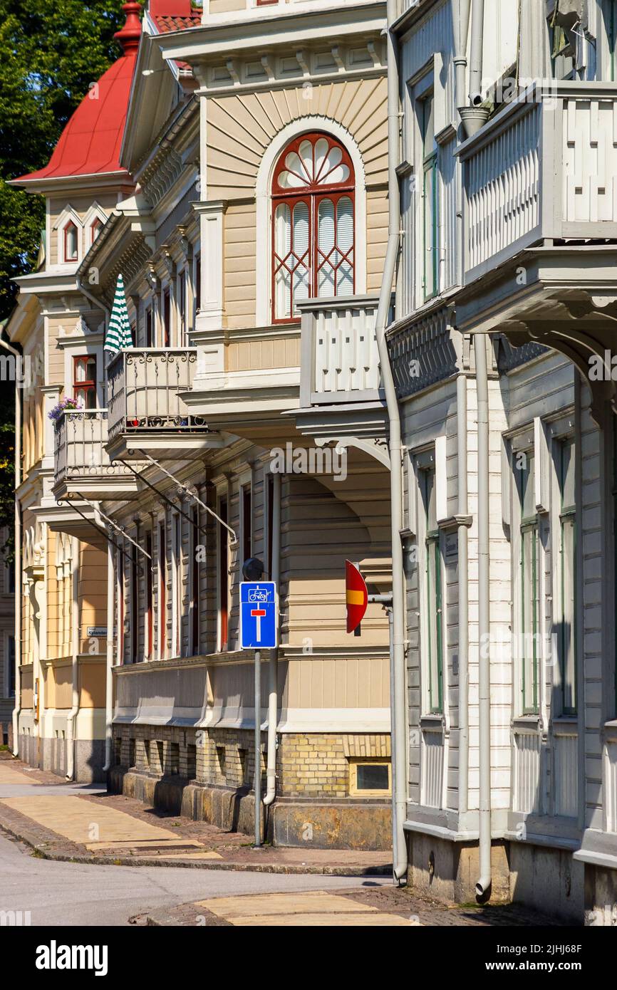 Idyllic old wooden houses on a city street in Sweden Stock Photo - Alamy