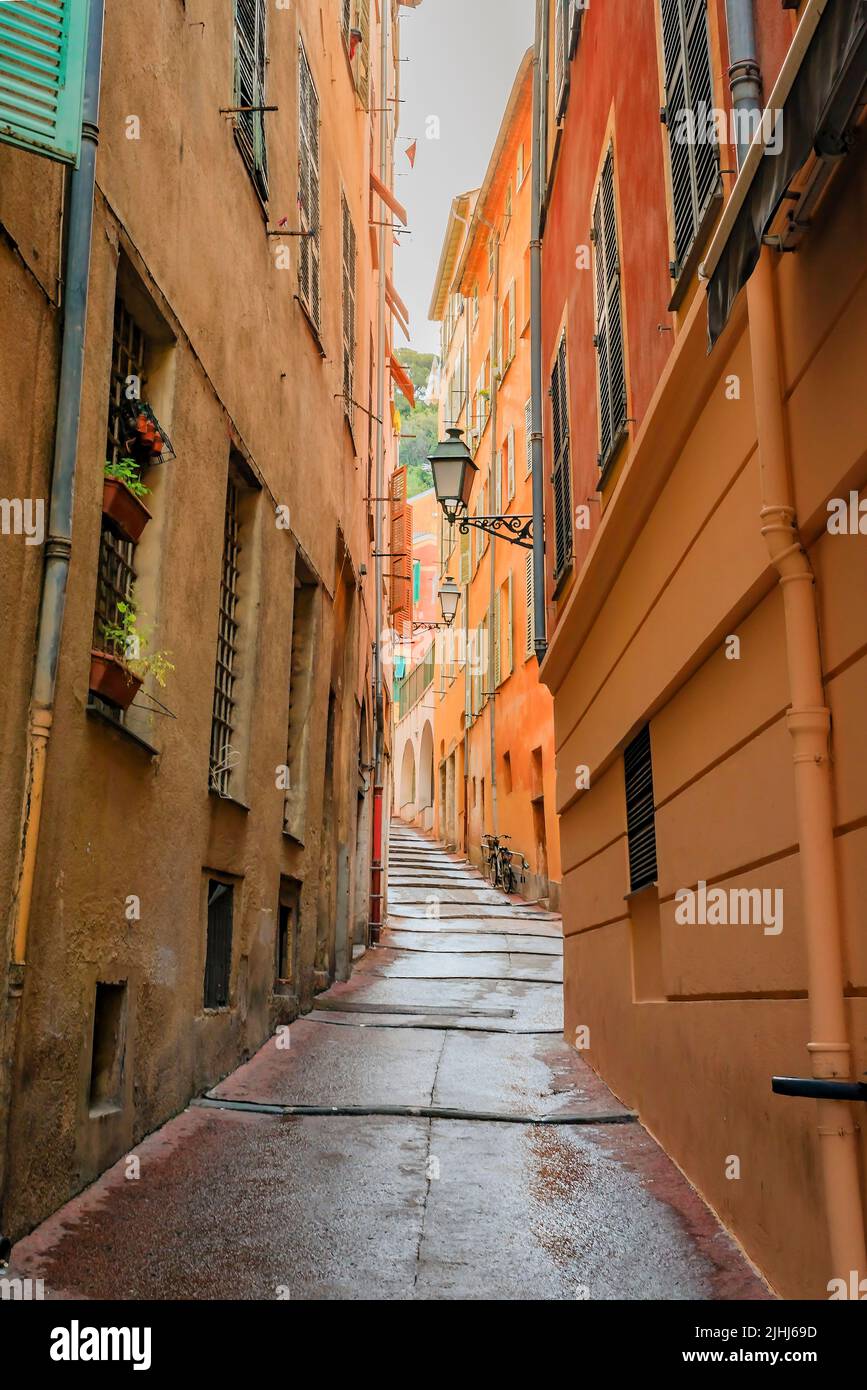 Narrow crooked street in the Old Town, Vieille Ville in Nice, French ...