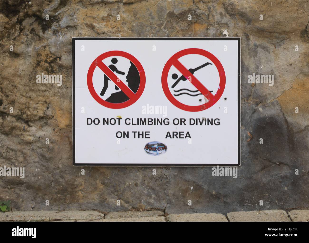 Do not climb sign or No diving sign Stock Photo - Alamy