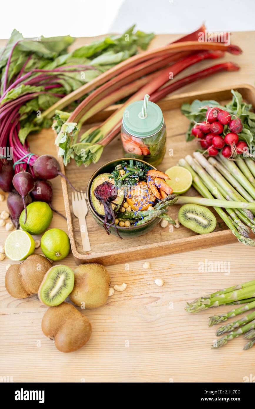 Table full of fresh food ingredients Stock Photo - Alamy