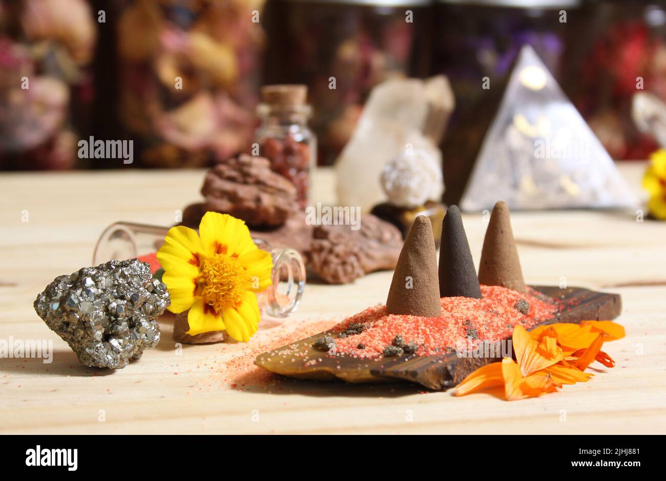 Incense Cones on Stone Slab With Chakra Crystals and Flowers Stock ...